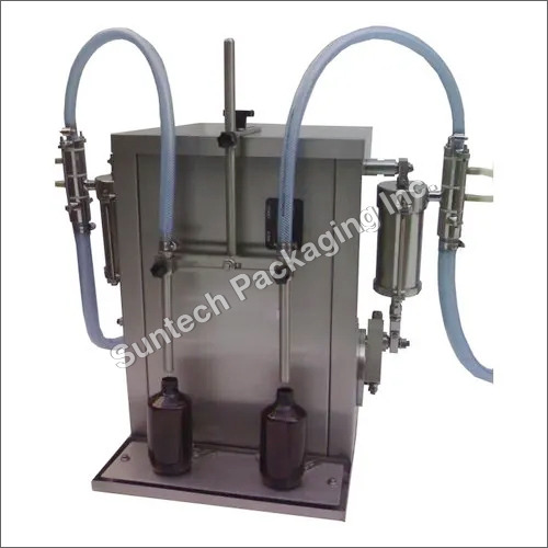 Volumetric Liquid Filling Machine at Best Price in Vasai | Suntech Packaging Inc