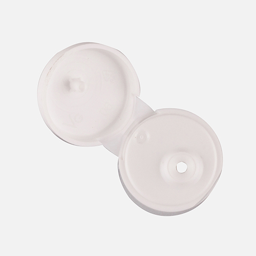 White On Off Center Hole Flip Top Cap at Best Price in Ahmedabad ...