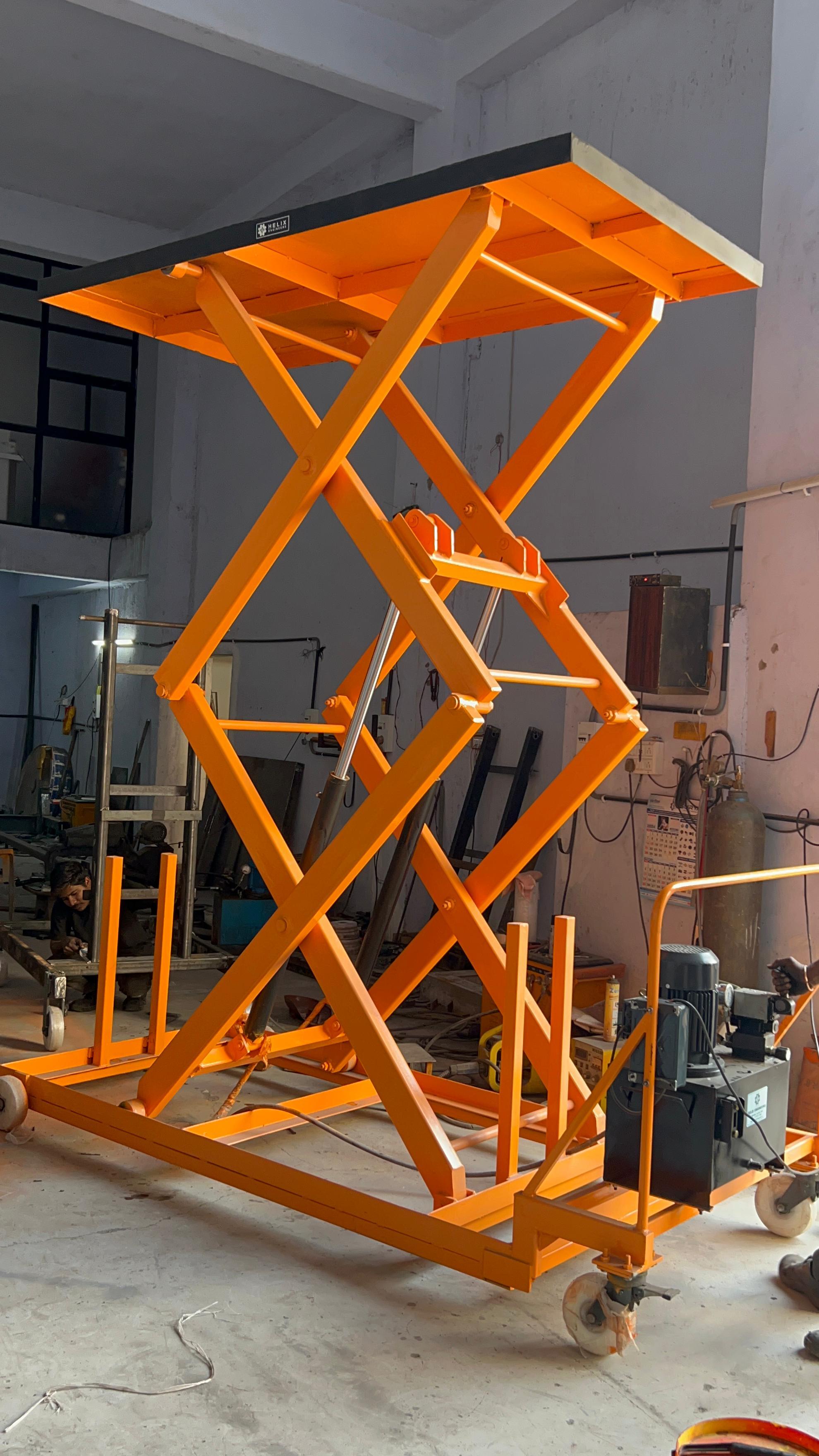 Semi Electric Scissor Lift Table at 64900.00 INR in Ahmedabad | Helix ...